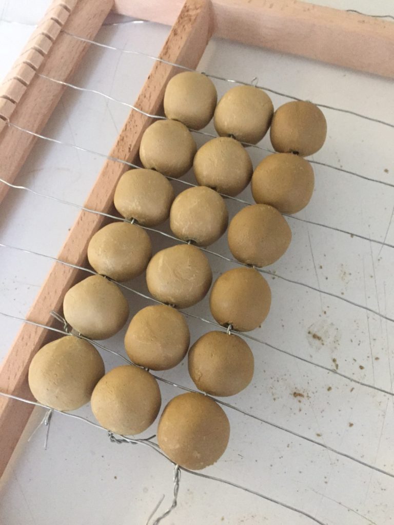 Weaving clay balls - THE LOVE SCHOOL PROJECT